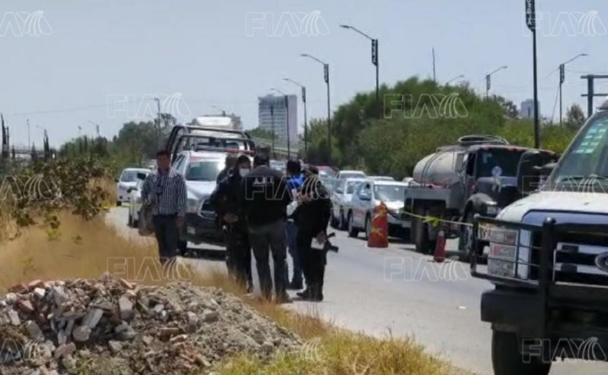 Hallan cadáver envuelto en cobijas en el Periférico Ecológico