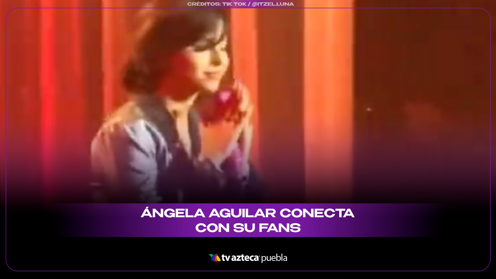 Ángela Aguilar gesto emotivo en concierto.
